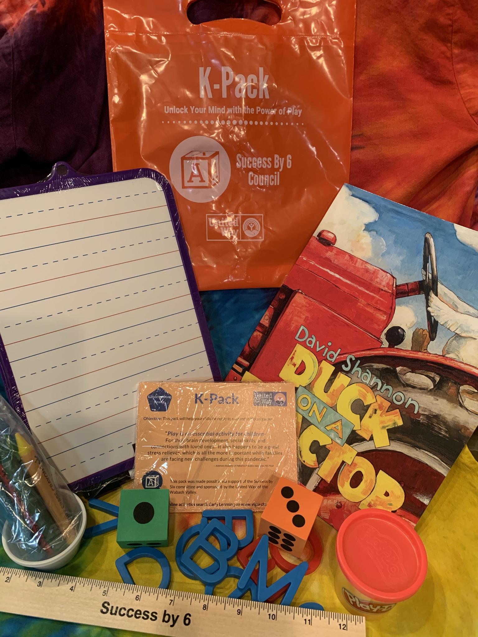 Preparing to Distribute K-Packs to Local Children – UWWV